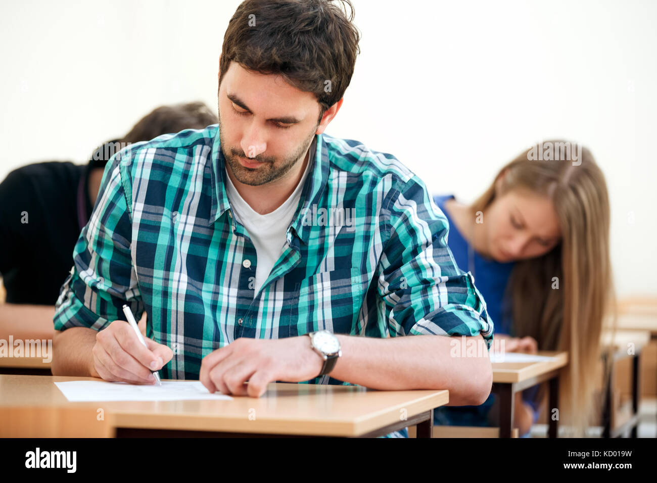 young student in a classroom with his colleagues Stock Photo - Alamy