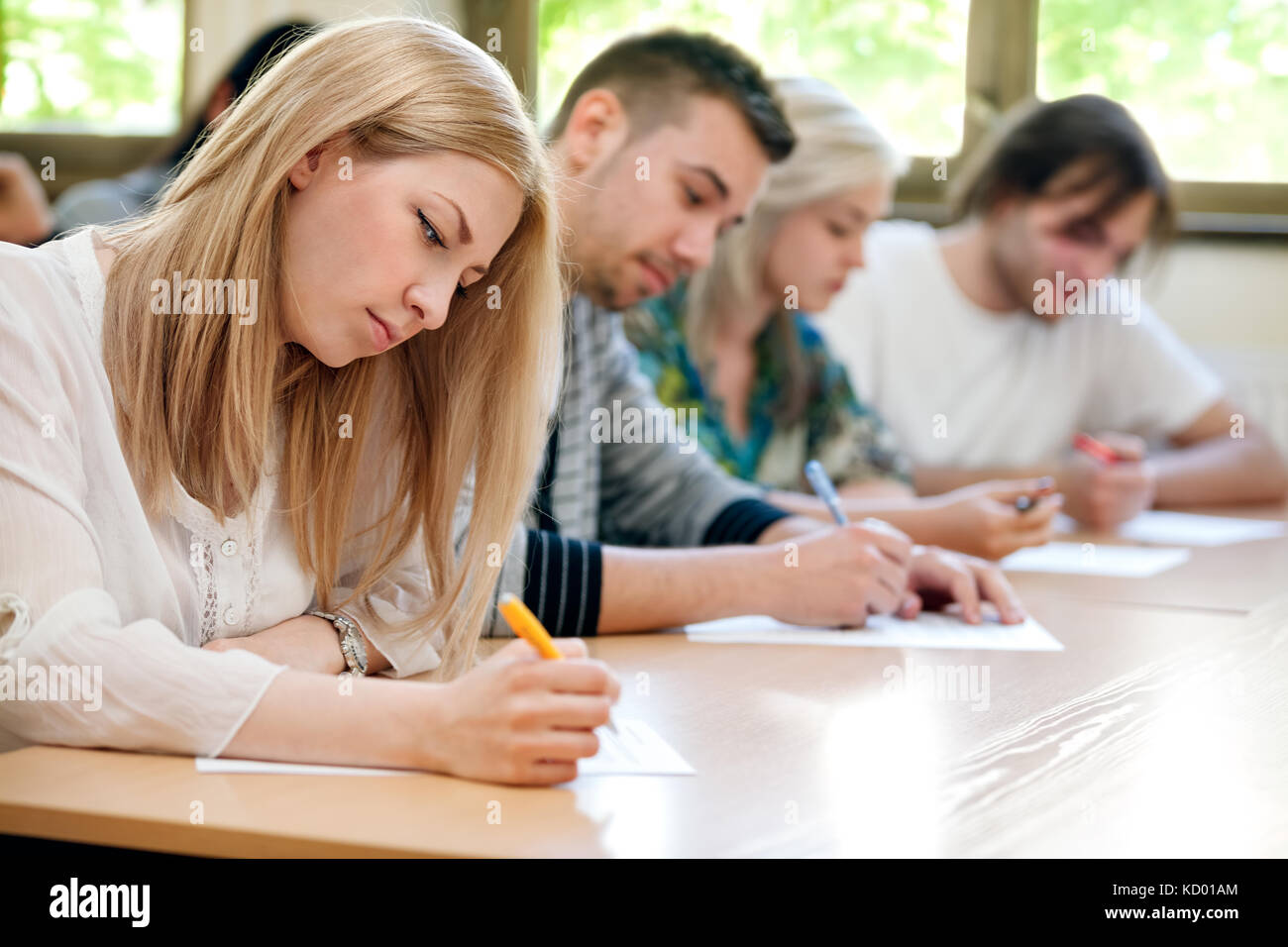 group of students takes the test in class Stock Photo - Alamy