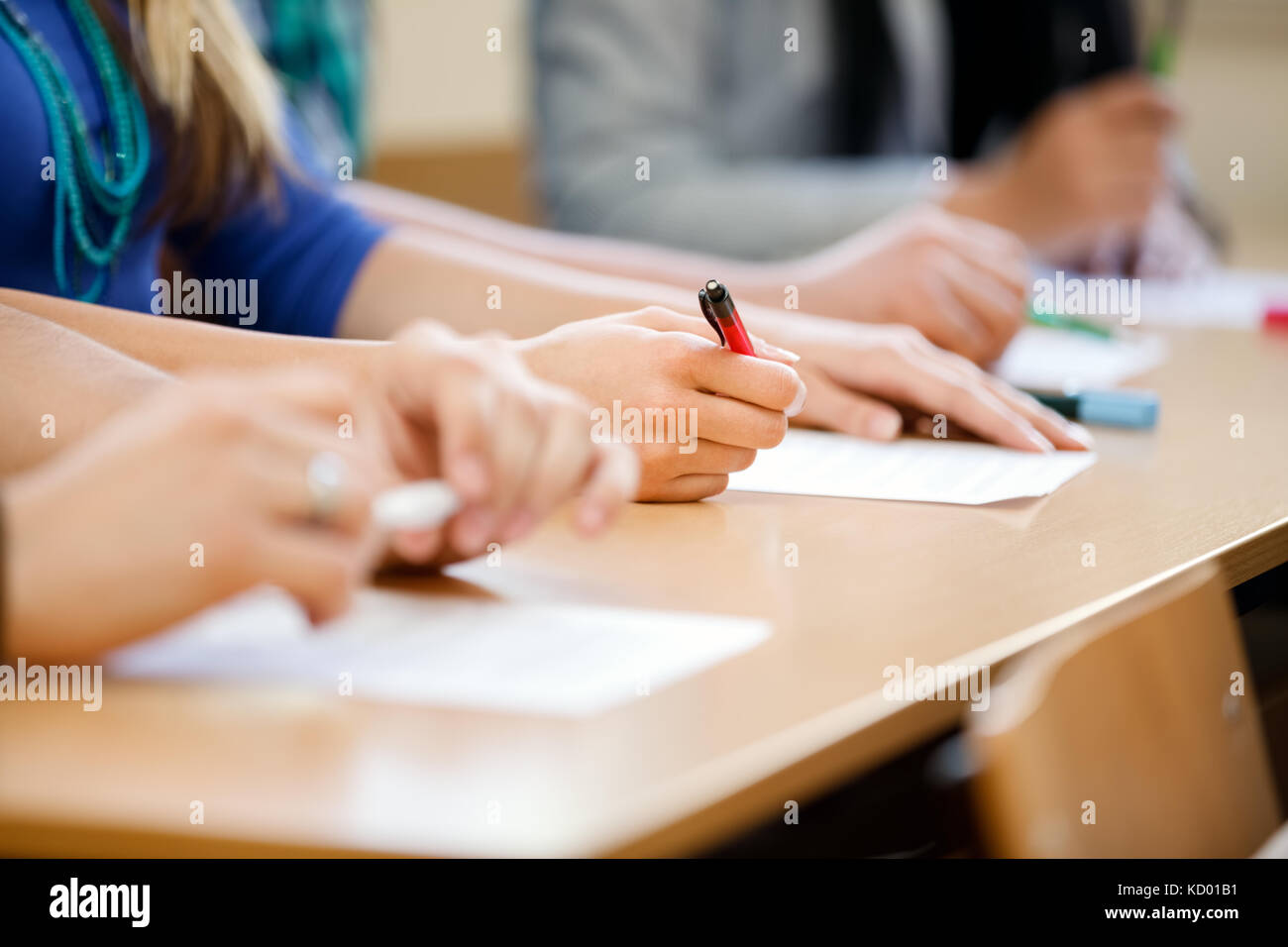 Student students writing hi-res stock photography and images - Alamy