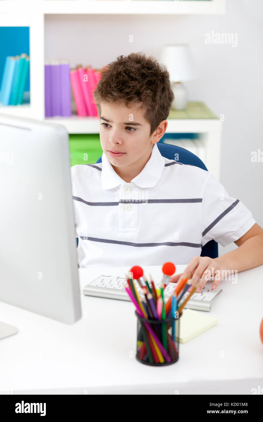 school boy learning with computer at home Stock Photo - Alamy