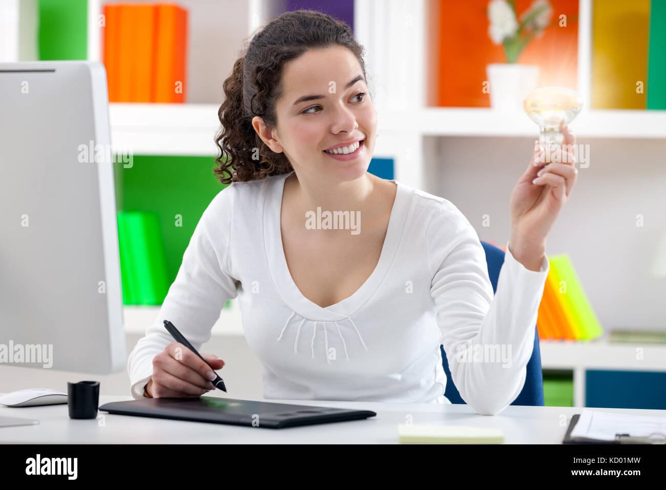 young designer woman having idea Stock Photo - Alamy