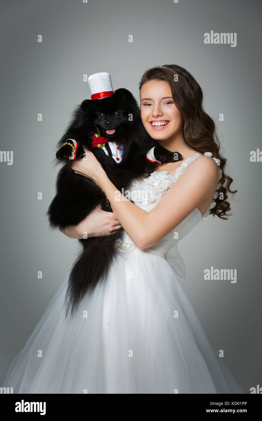 bride girl with spitz goom in wedding suit Stock Photo - Alamy