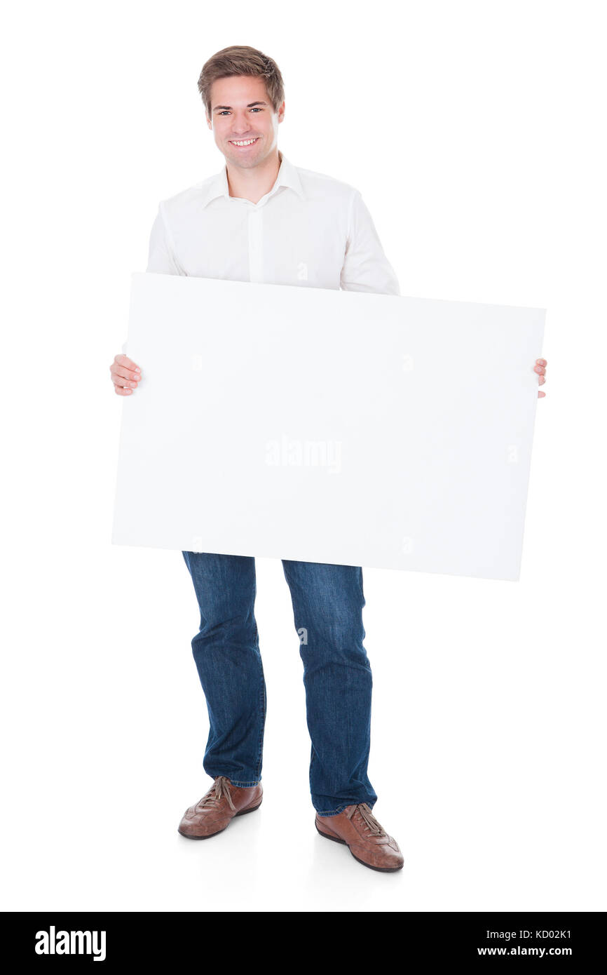 Young person holding sign Cut Out Stock Images & Pictures - Alamy