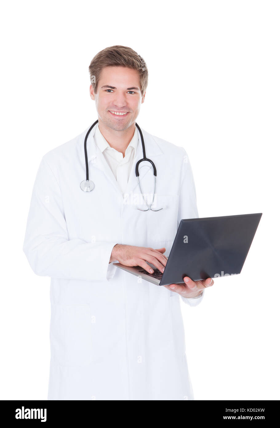 Happy Young Doctor Using Laptop Over White Background Stock Photo - Alamy
