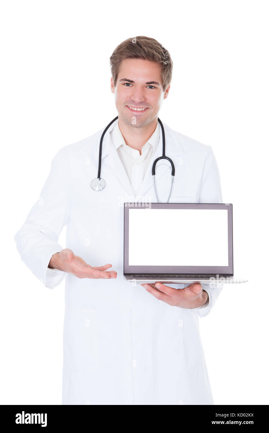 Happy Young Doctor Using Laptop Over White Background Stock Photo - Alamy