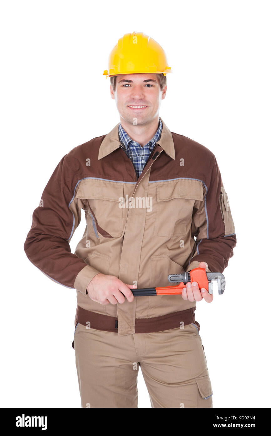 Male Plumber Holding Wrench And Toolkit On White Background Stock Photo ...