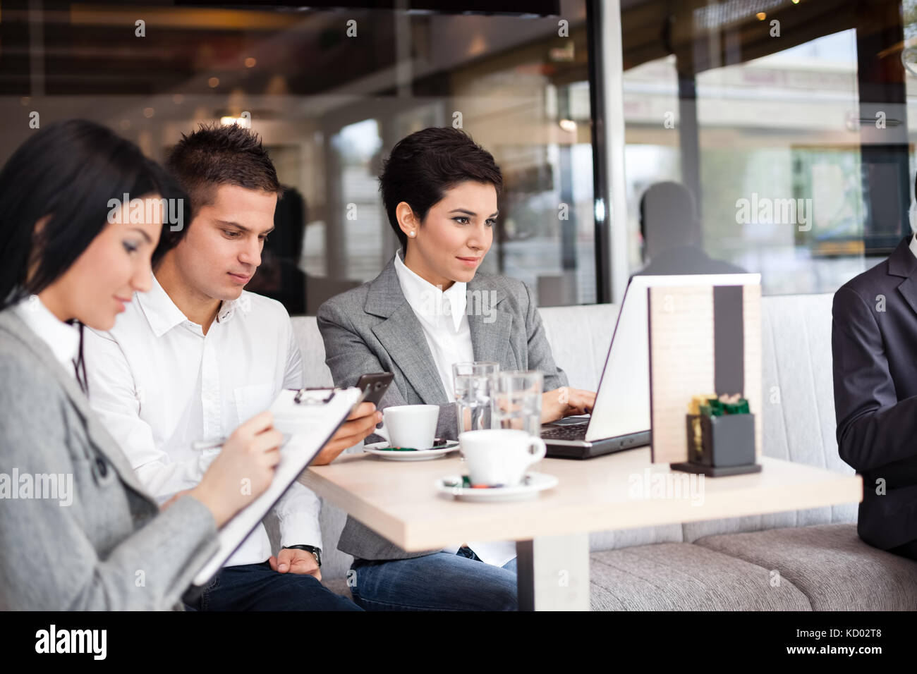 Group businesspeople having briefing in hi-res stock photography and ...