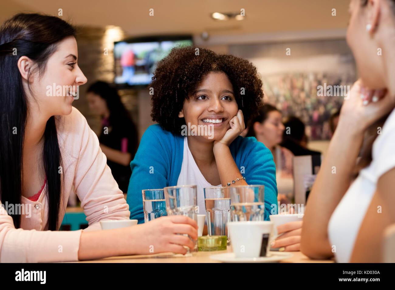 teenagers girls in cafe chatting in cafe, leisure activities Stock ...