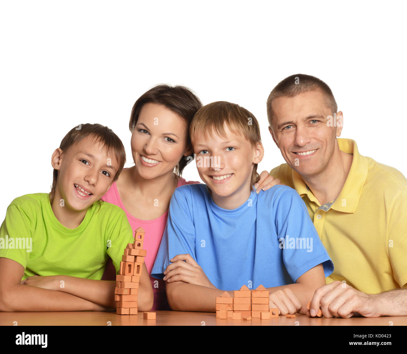 Family playing with wooden blocks Stock Photo - Alamy