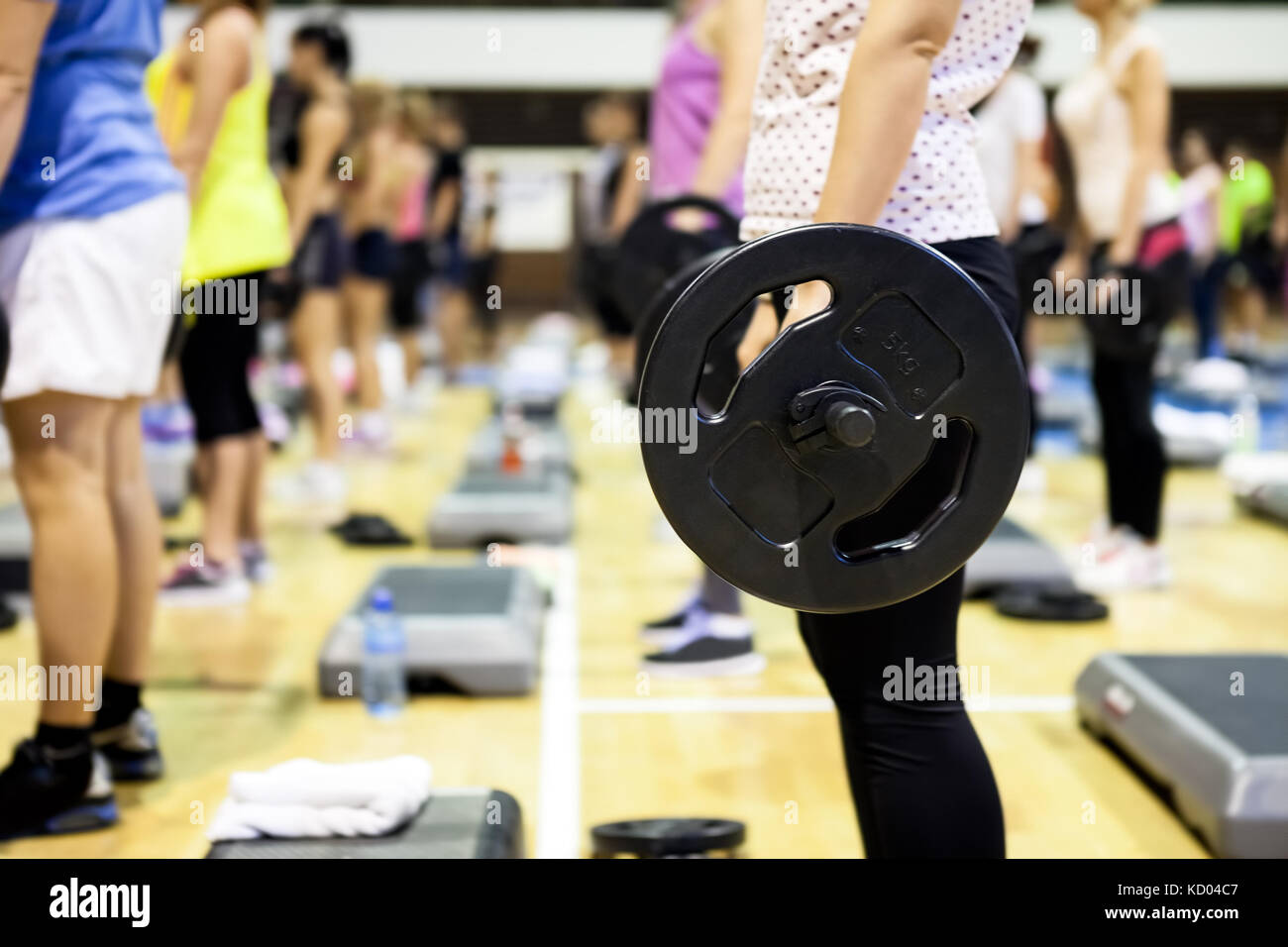 group with dumbbell weight training on sport gym Stock Photo - Alamy