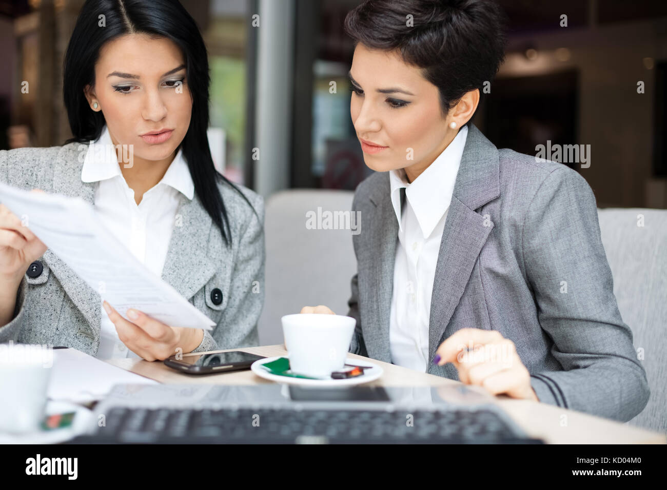 Two business women in meeting Stock Photo - Alamy