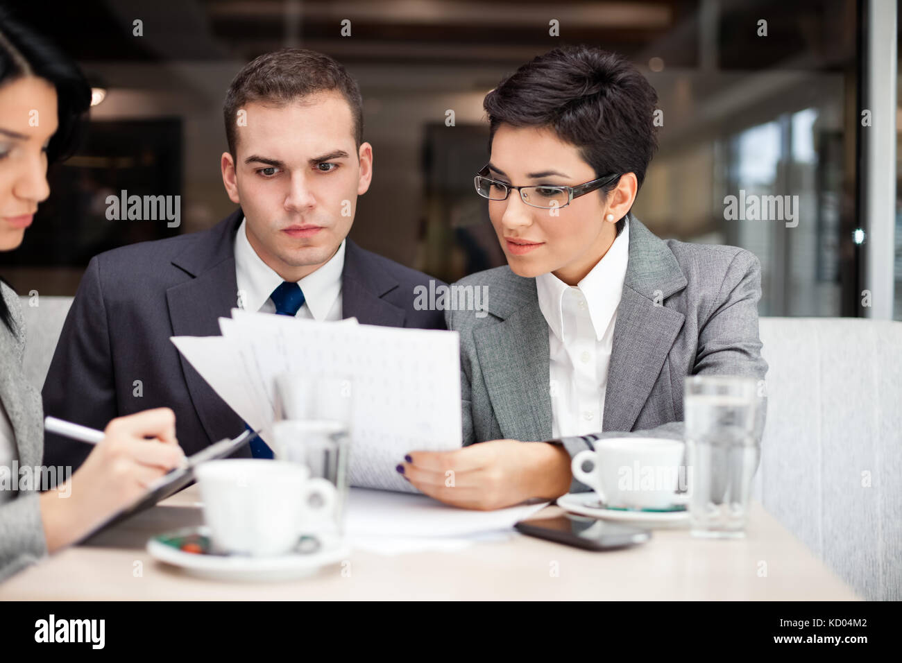 businesswoman consulting a partner Stock Photo - Alamy