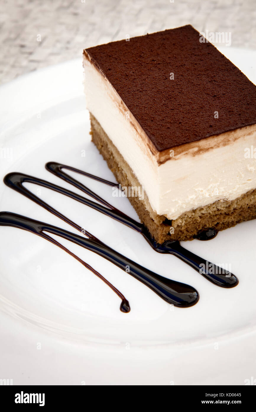 Delicious cheesecake on plate Stock Photo - Alamy