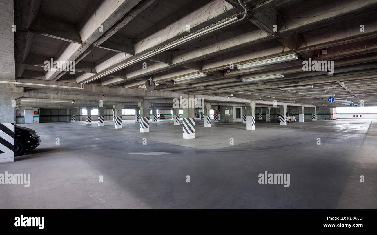big parking area in basement of building Stock Photo - Alamy