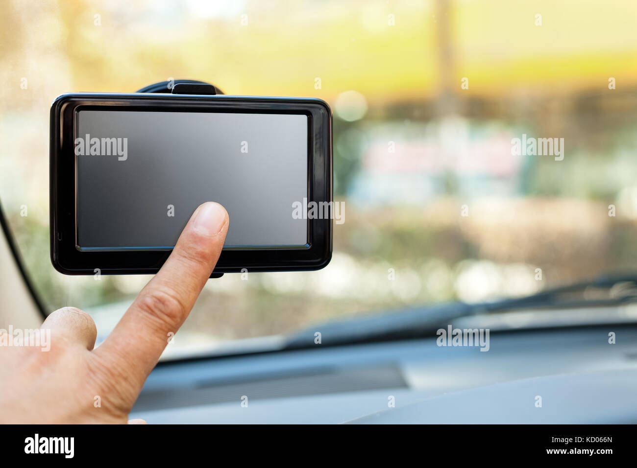 finger pointing at car GPS navigation system Stock Photo - Alamy