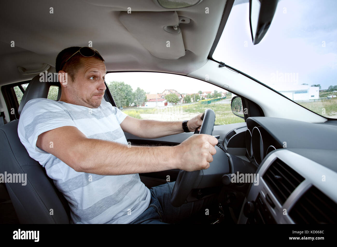 Scared man driving car very fast, focused on the driver's face Stock ...