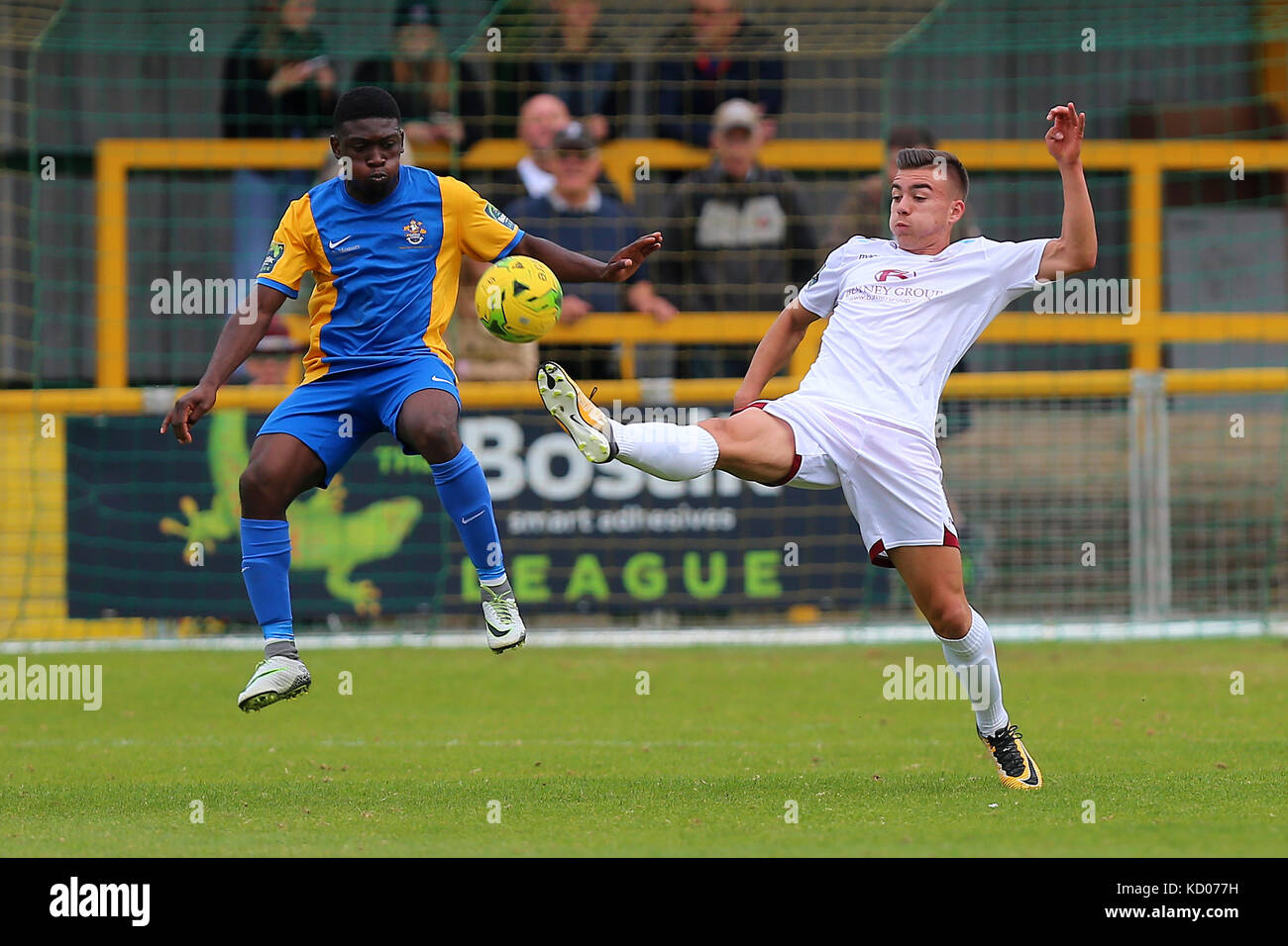 Ayodeji Olukoga of Romford and Louis Rogers of Hastings during Romford ...