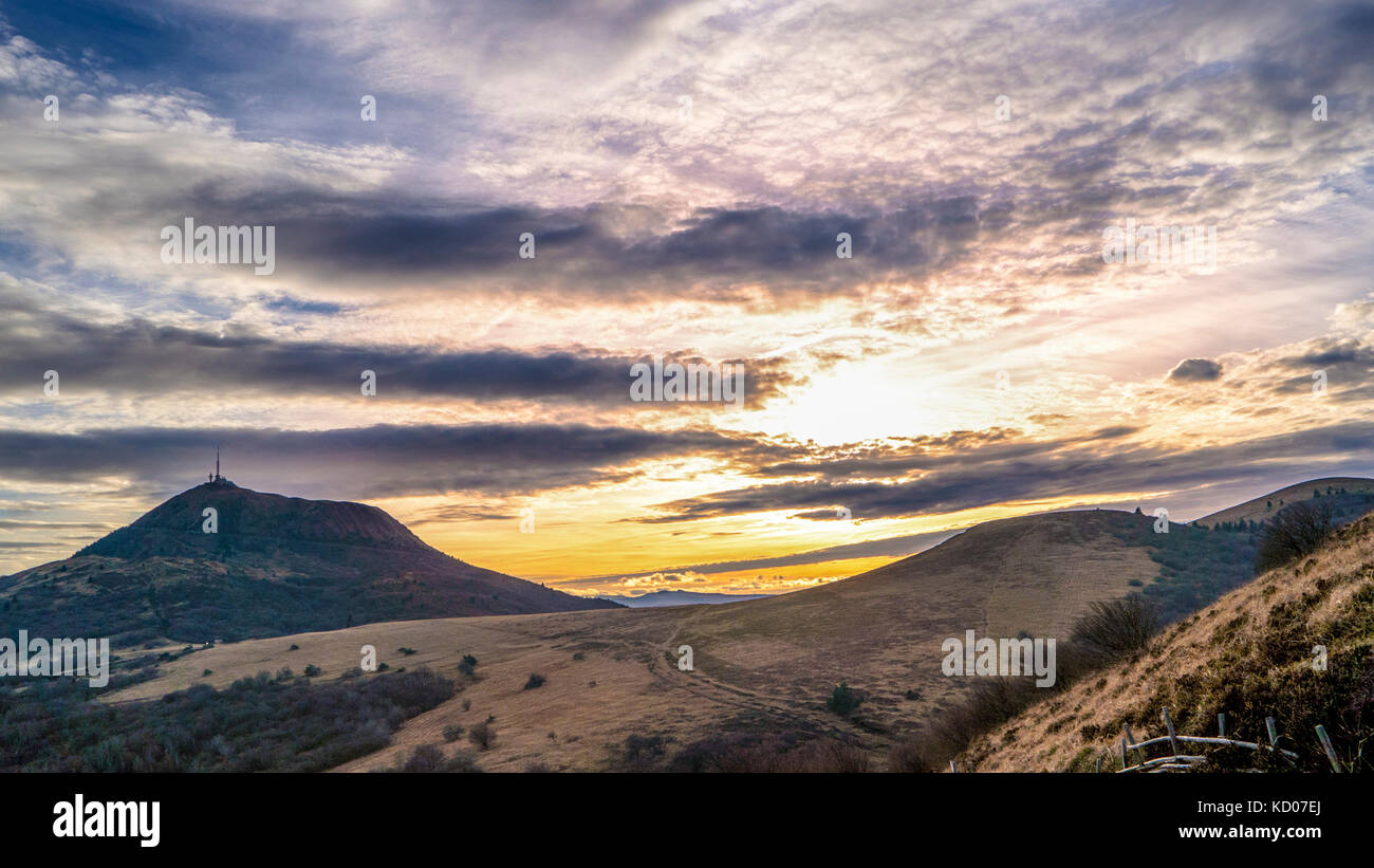 Volcanoes at sunset Stock Photo - Alamy