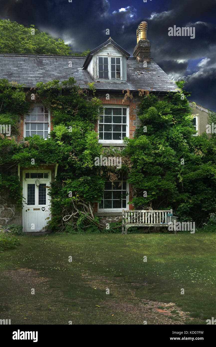 Spooky 'Haunted' House at nightfall with a serious storm brewing Stock ...