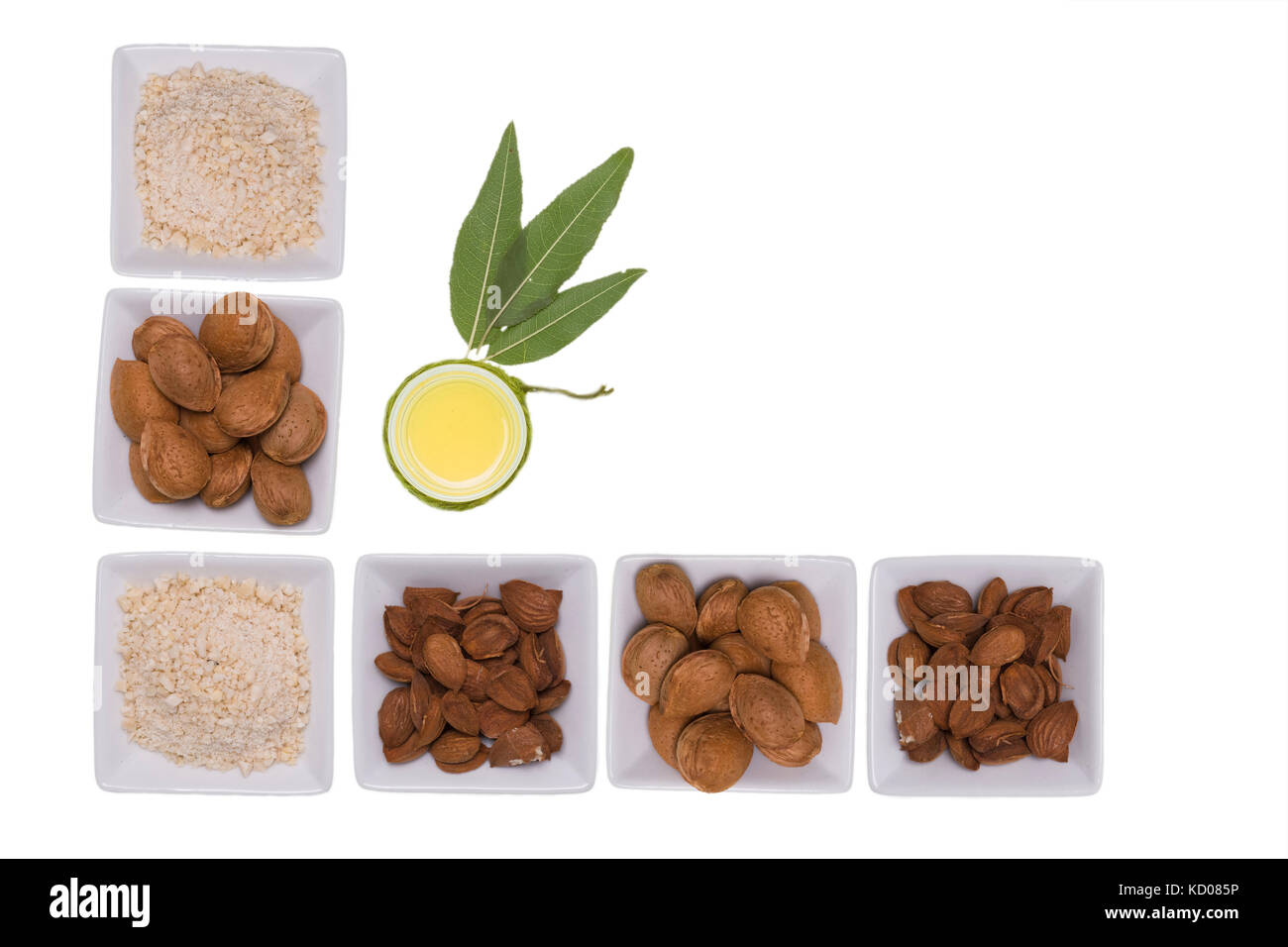 Composition with almonds white pots over white background Stock Photo ...