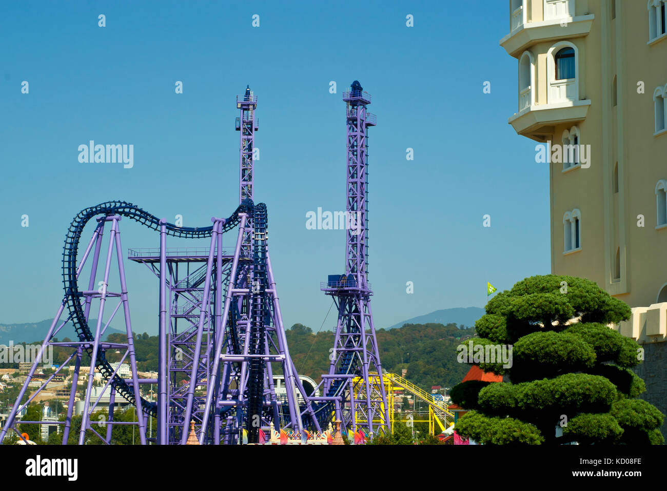 General view of amusement park with roller coaster Stock Photo - Alamy