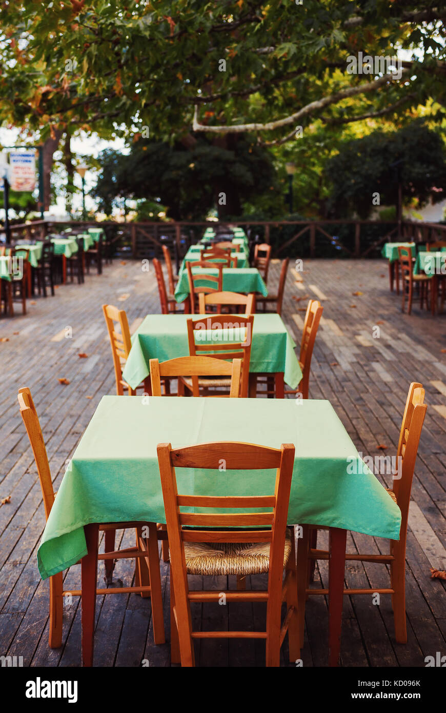 One part of wooden restaurant balcony, view on chairs and tables Stock ...