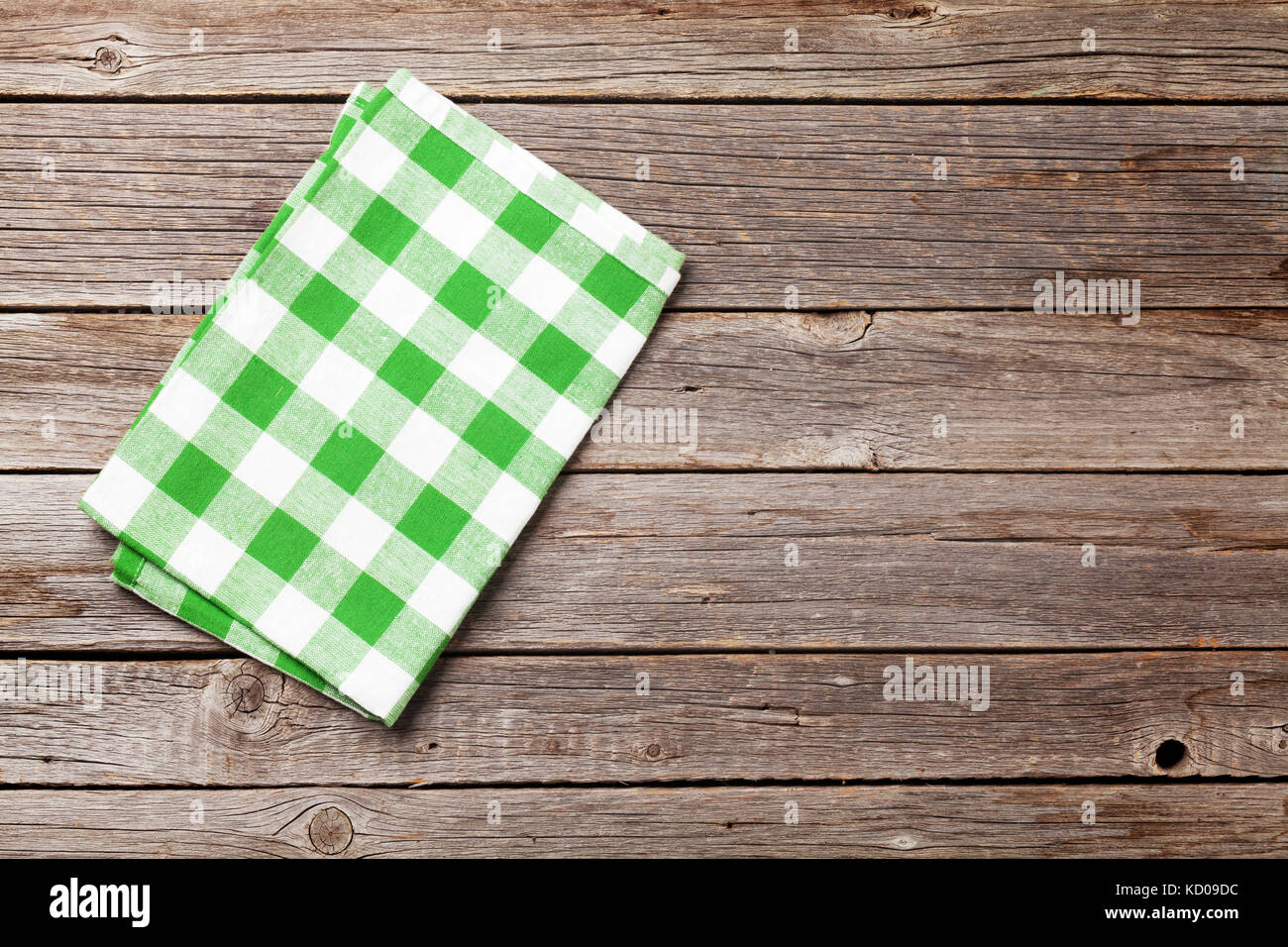 Kitchen towel on wooden cooking table. Top view with copy space Stock ...
