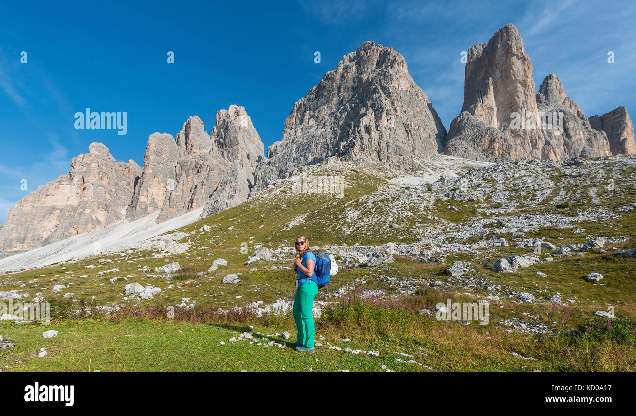 Hiker on the hiking trail to the Three Peaks, Sesto Dolomites, South ...