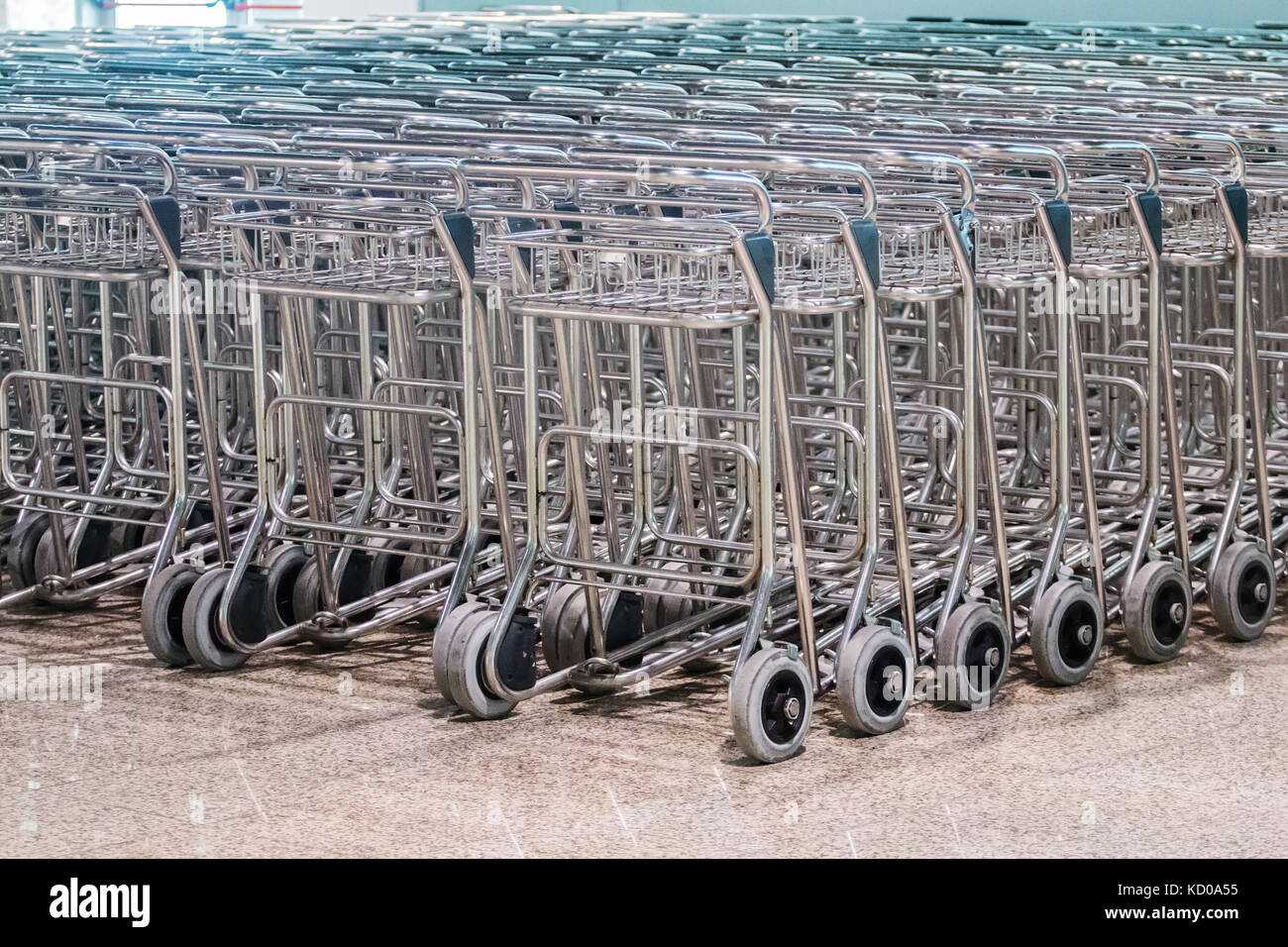 Close view of a bunch of Airport baggage trolleys Stock Photo - Alamy