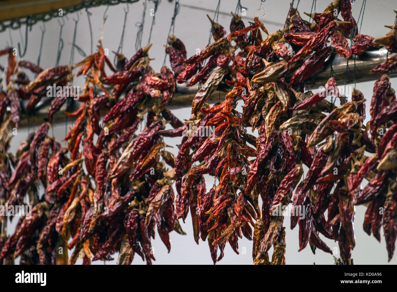 Dry hot chilli pepper at sale on the market Stock Photo - Alamy