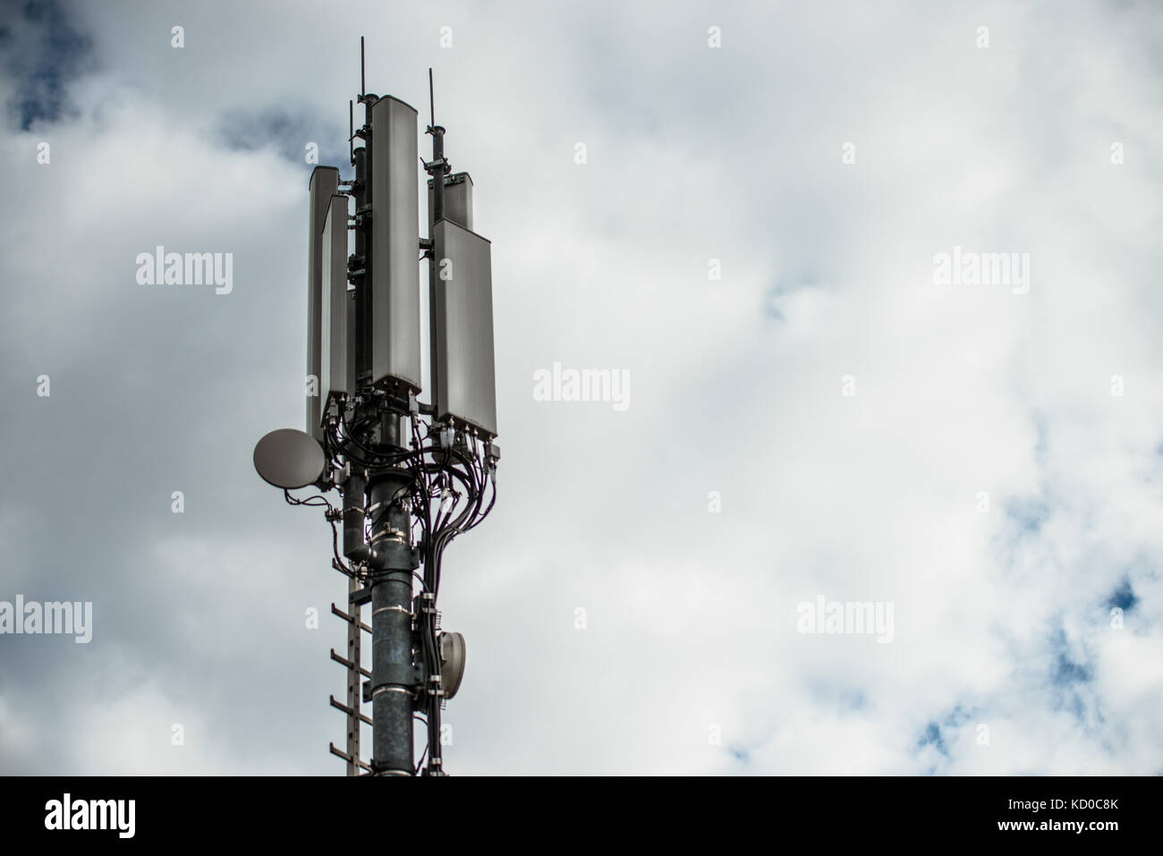 Cell phone cellular transmission tower clouds Stock Photo - Alamy