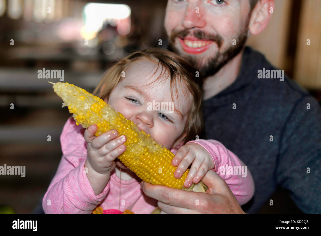 Child eating corn on the cob Stock Photo - Alamy
