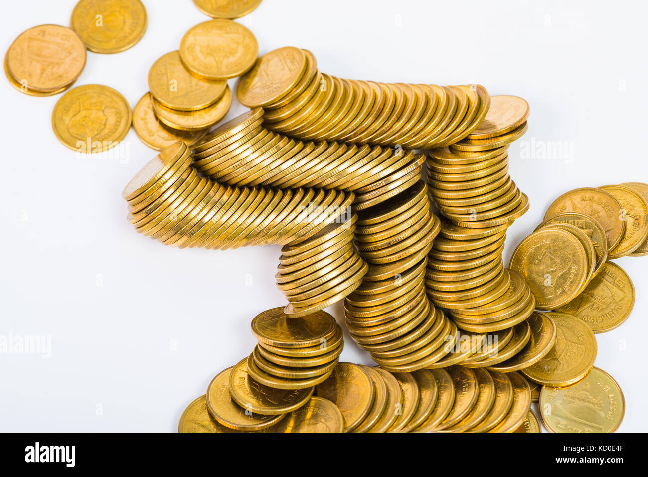 Columns of gold coins, piles of coins arranged on white background ...