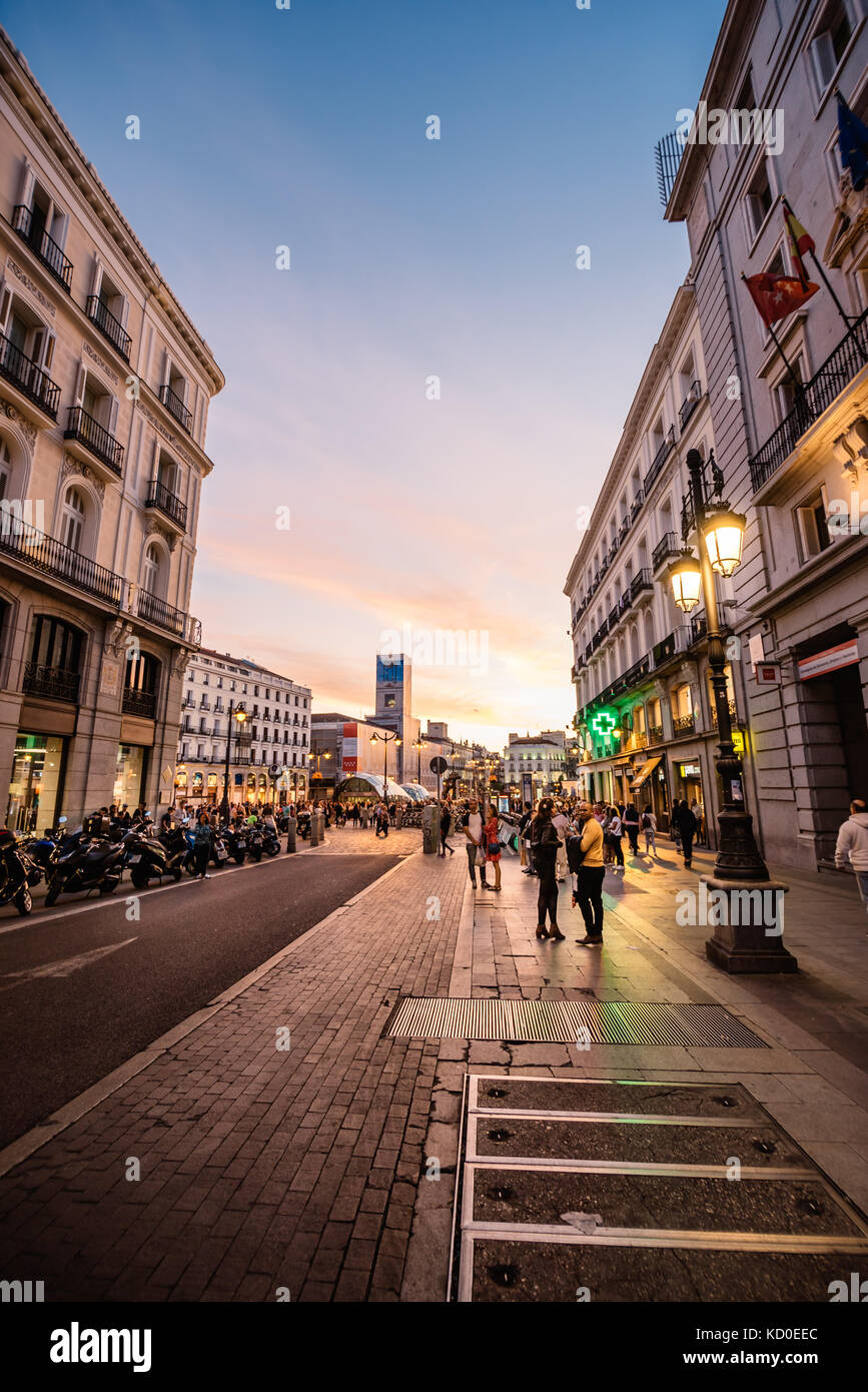 Scenic view of street in city centre of Madrid at sunset Stock Photo ...