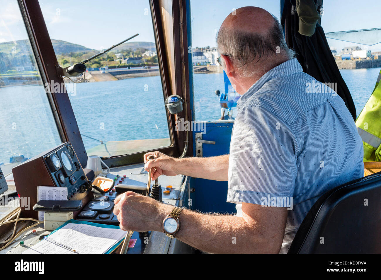 Valentia Island Car Ferry captain at the helm Stock Photo - Alamy