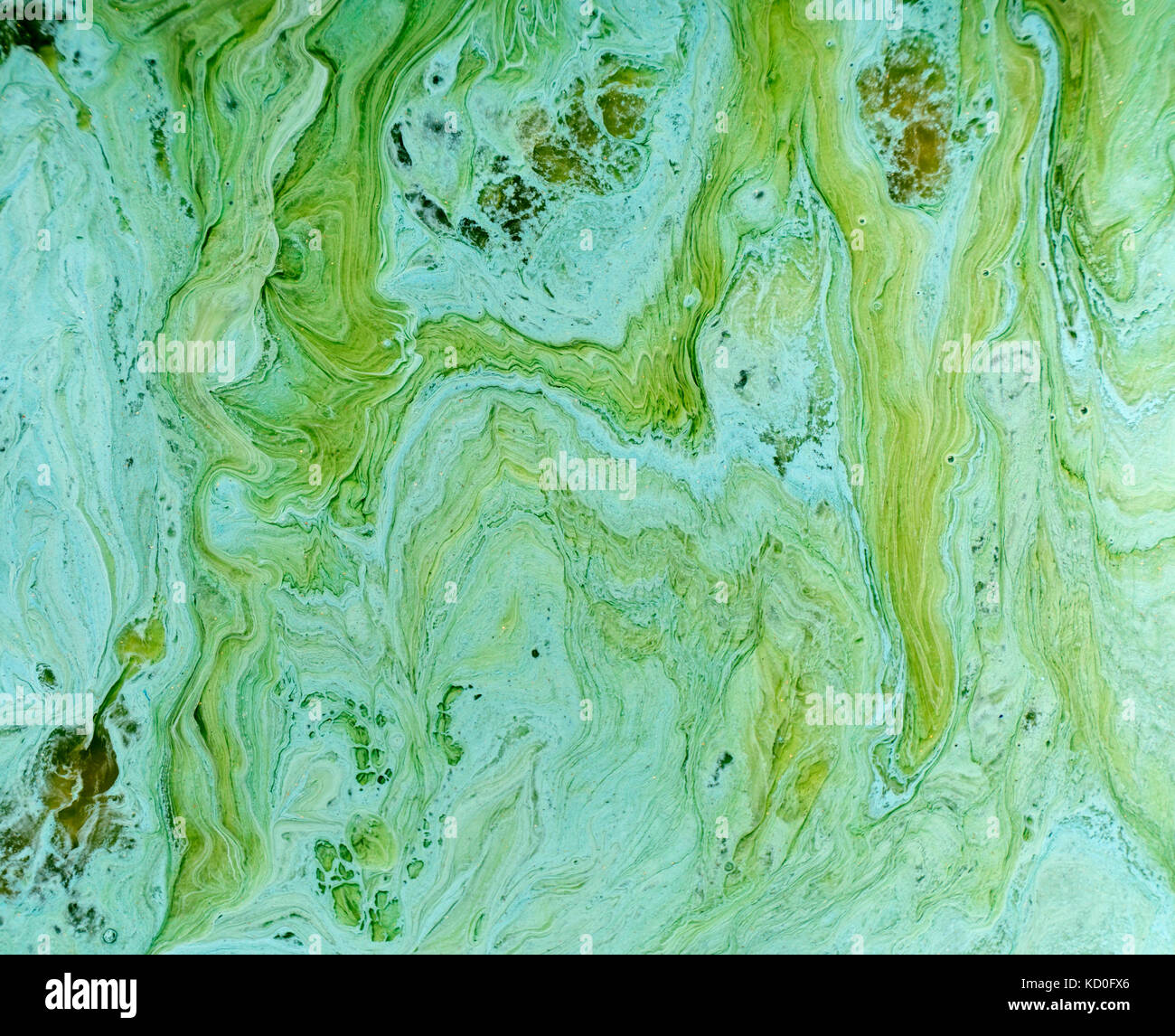 Marbled green abstract background with golden sequins. Liquid marble ...