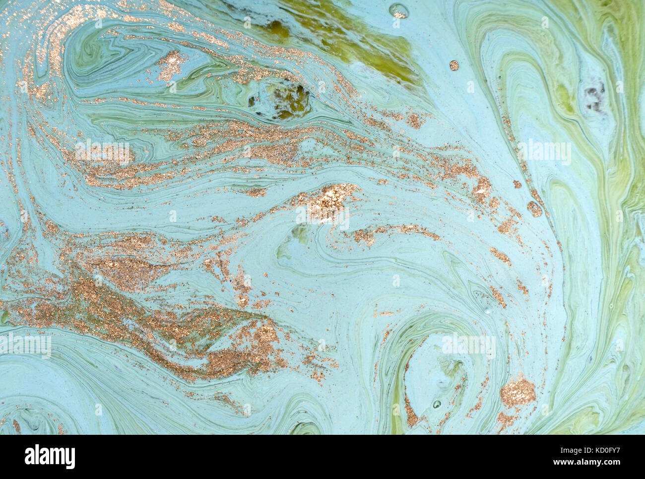 Marbled green abstract background with golden sequins. Liquid marble ...