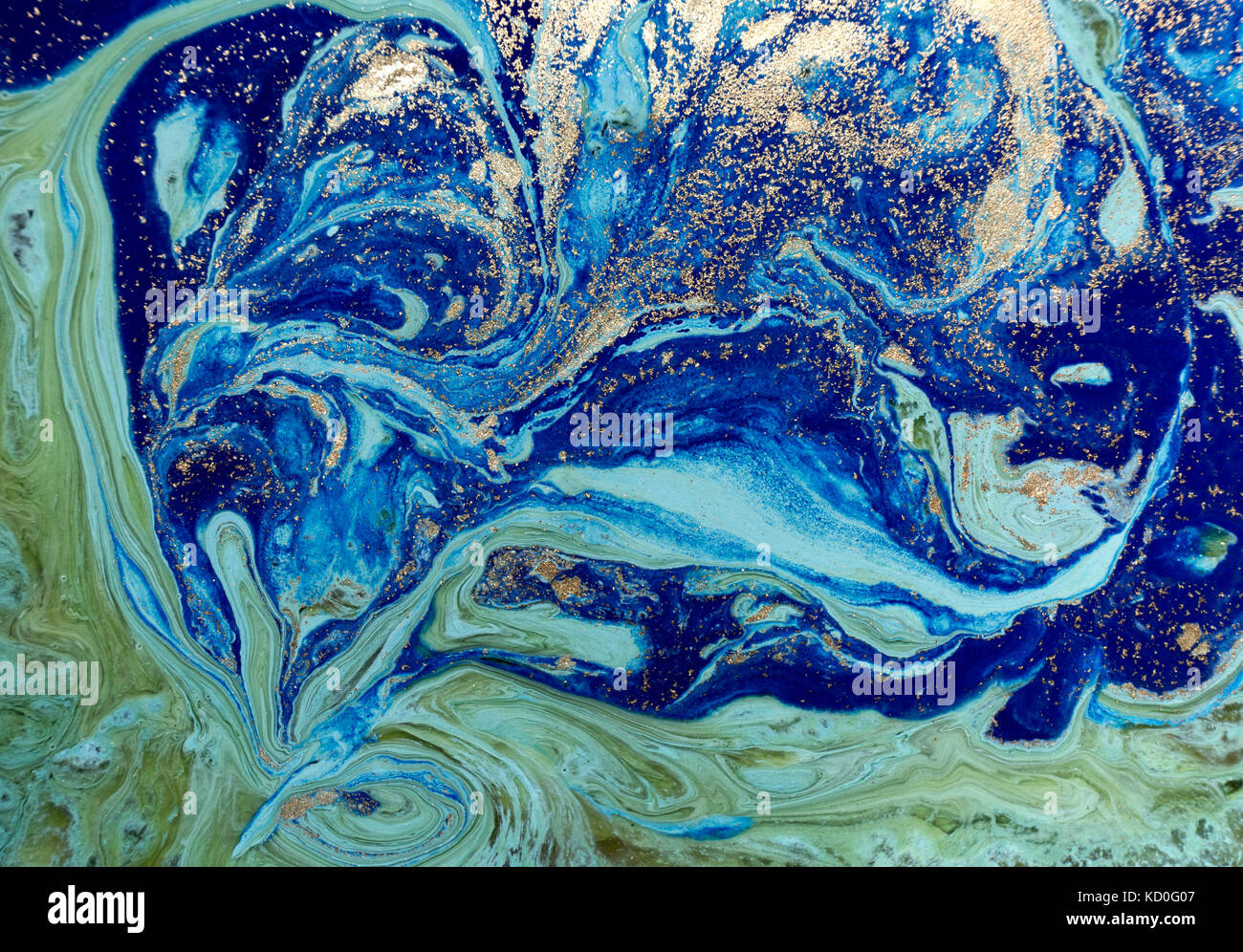 Marbled green and blue abstract background with golden sequins. Liquid ...