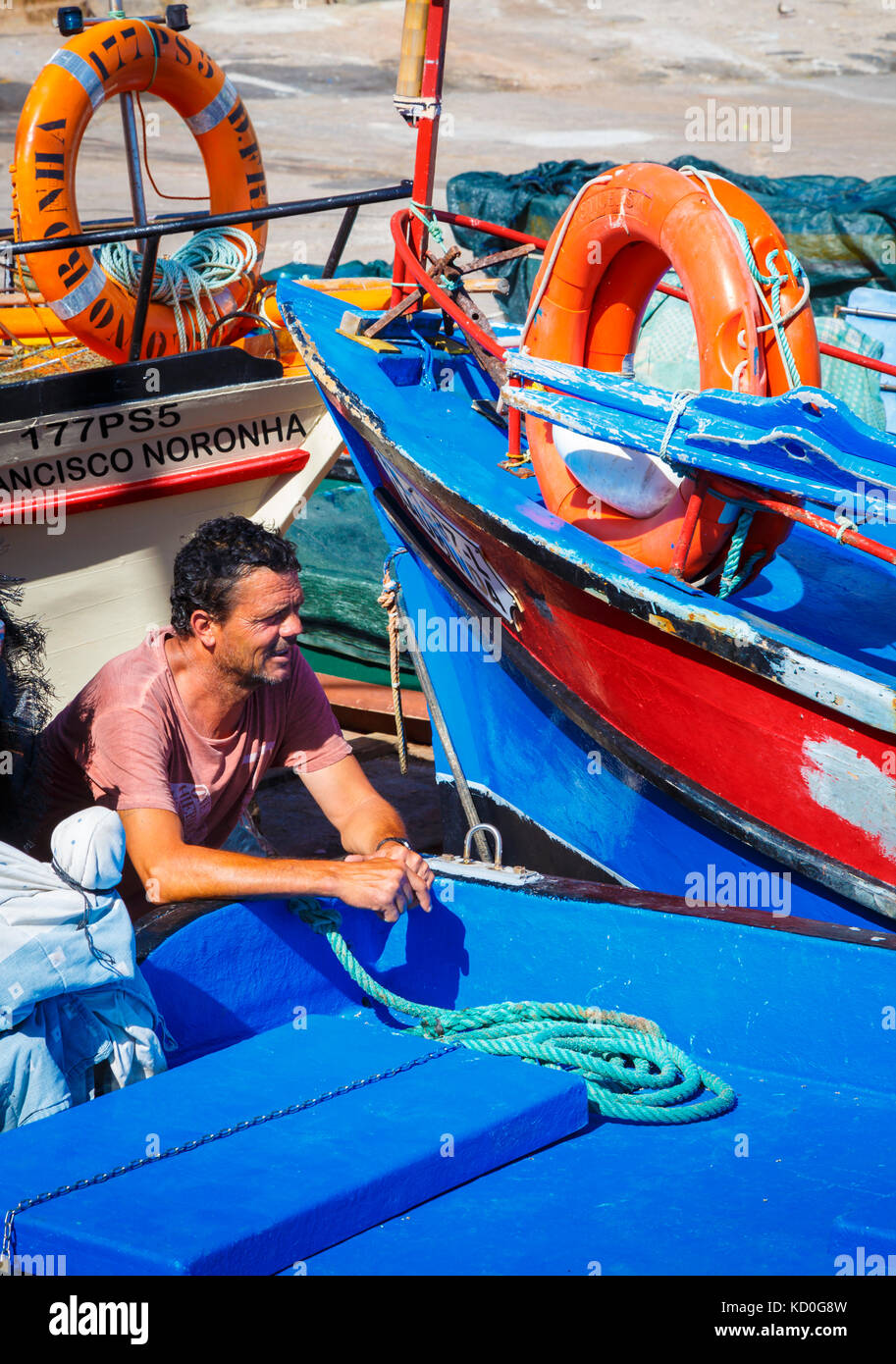 Seaman on the harbour Stock Photo - Alamy