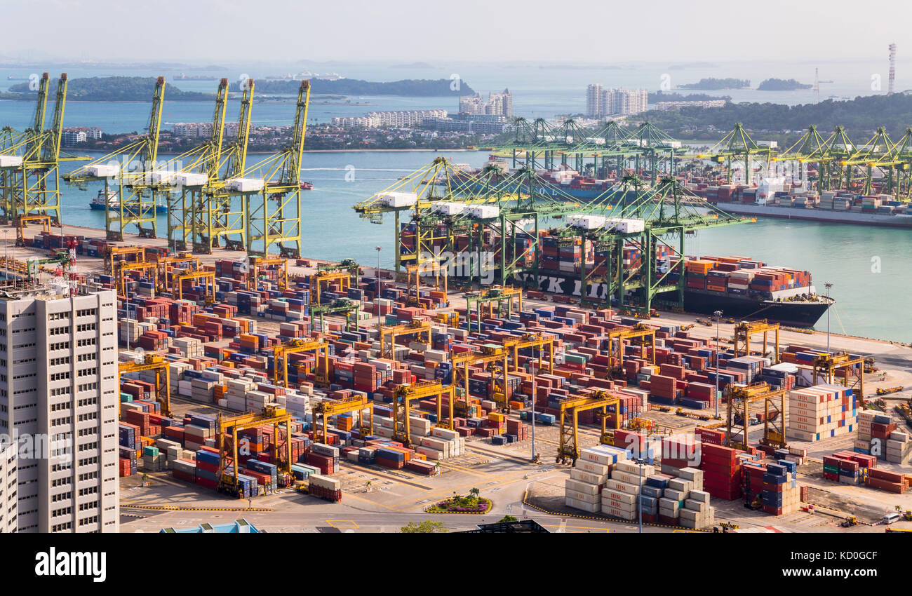 Elevated view of container terminal, cranes and container ship ...