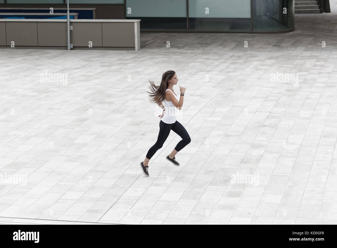 Woman brown hair running hi-res stock photography and images - Alamy