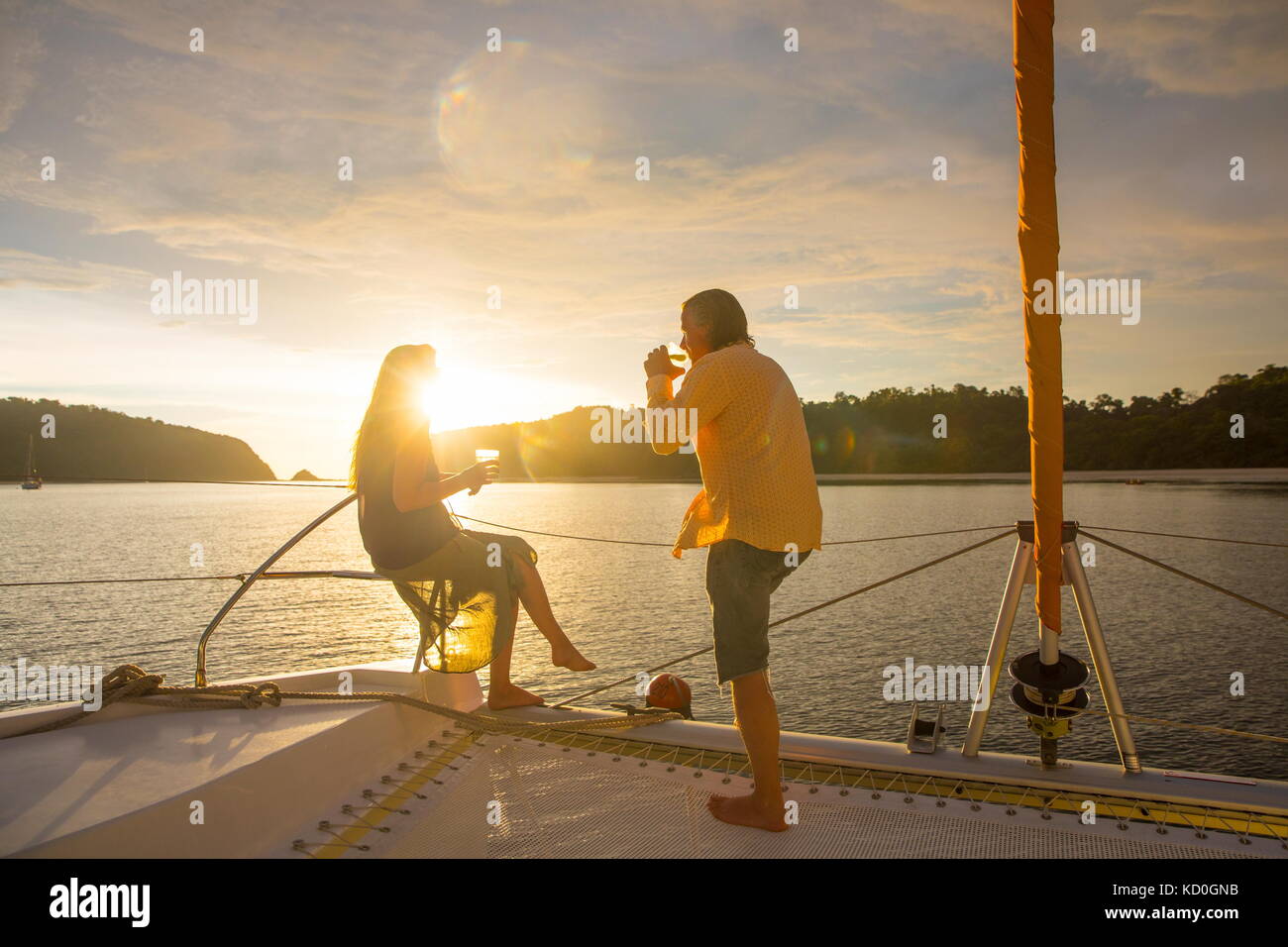 Couple relaxing on yacht at sunset, Koh Rok Noi, Thailand, Asia Stock ...