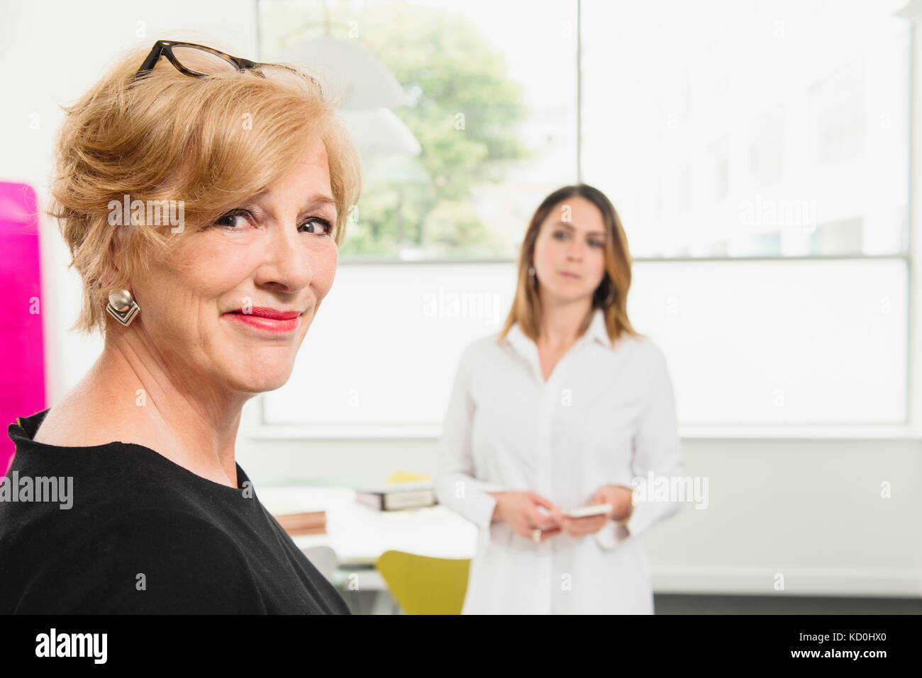 Women taking break in office Stock Photo - Alamy
