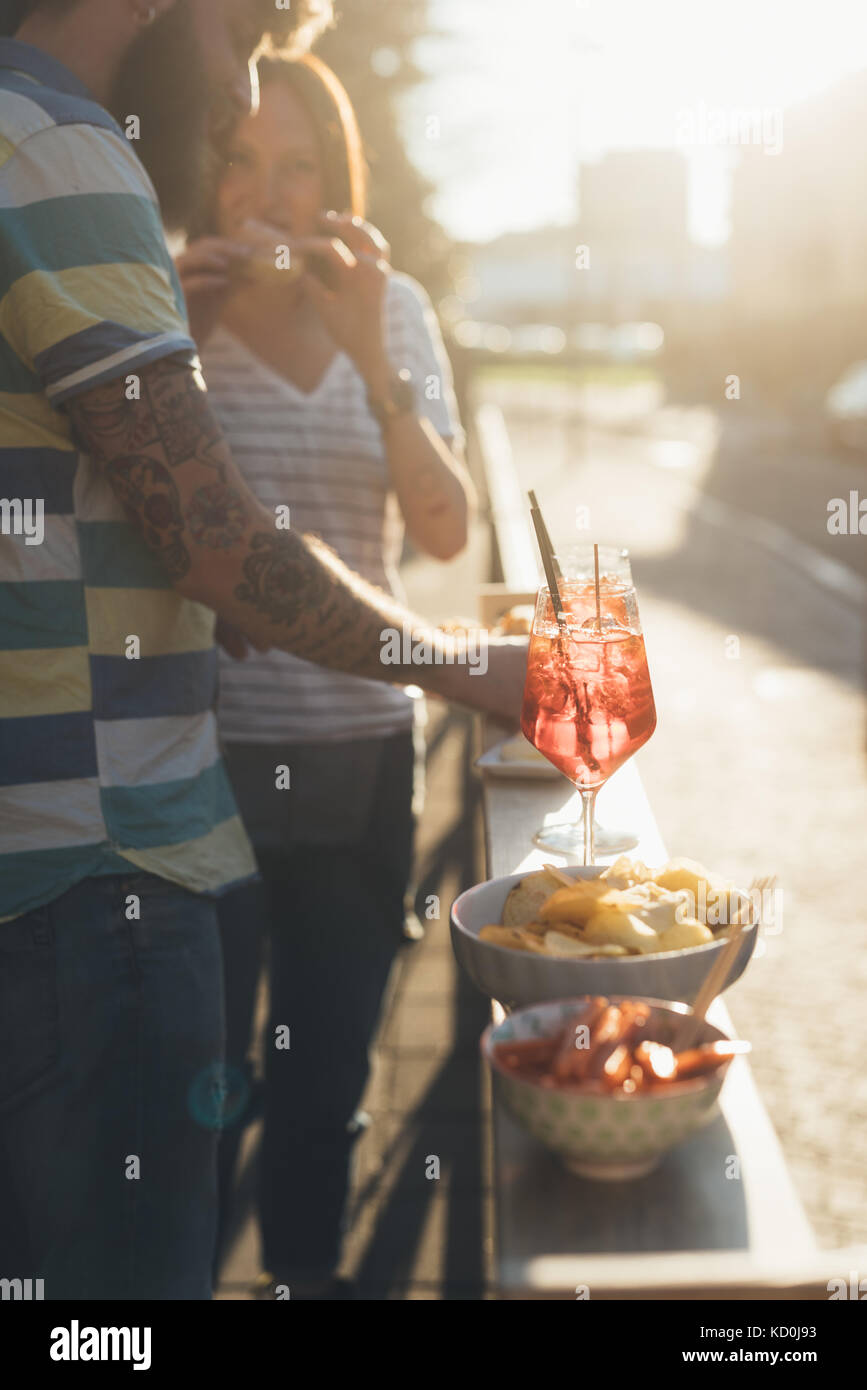 Young woman eating tapas hi-res stock photography and images - Alamy