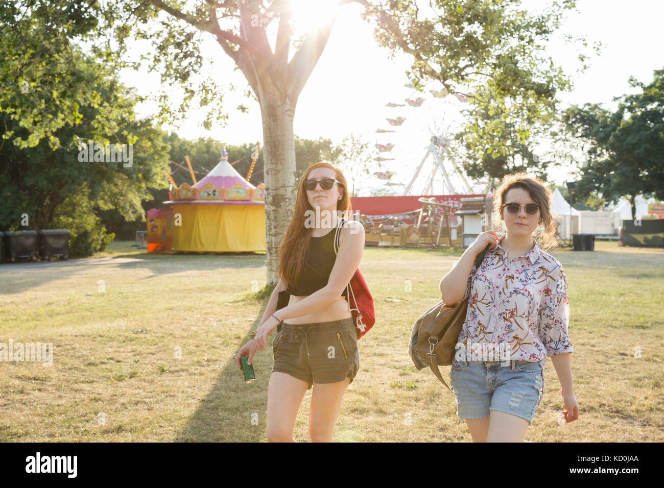Portrait of two female friends at festival Stock Photo - Alamy