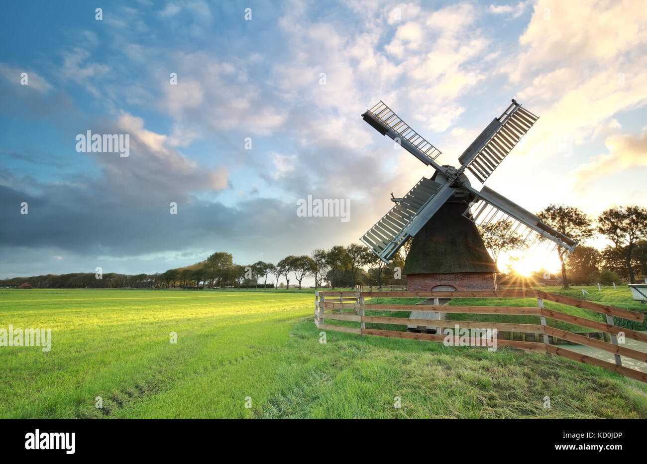 charming Dutch windmill ats sunrise Stock Photo - Alamy