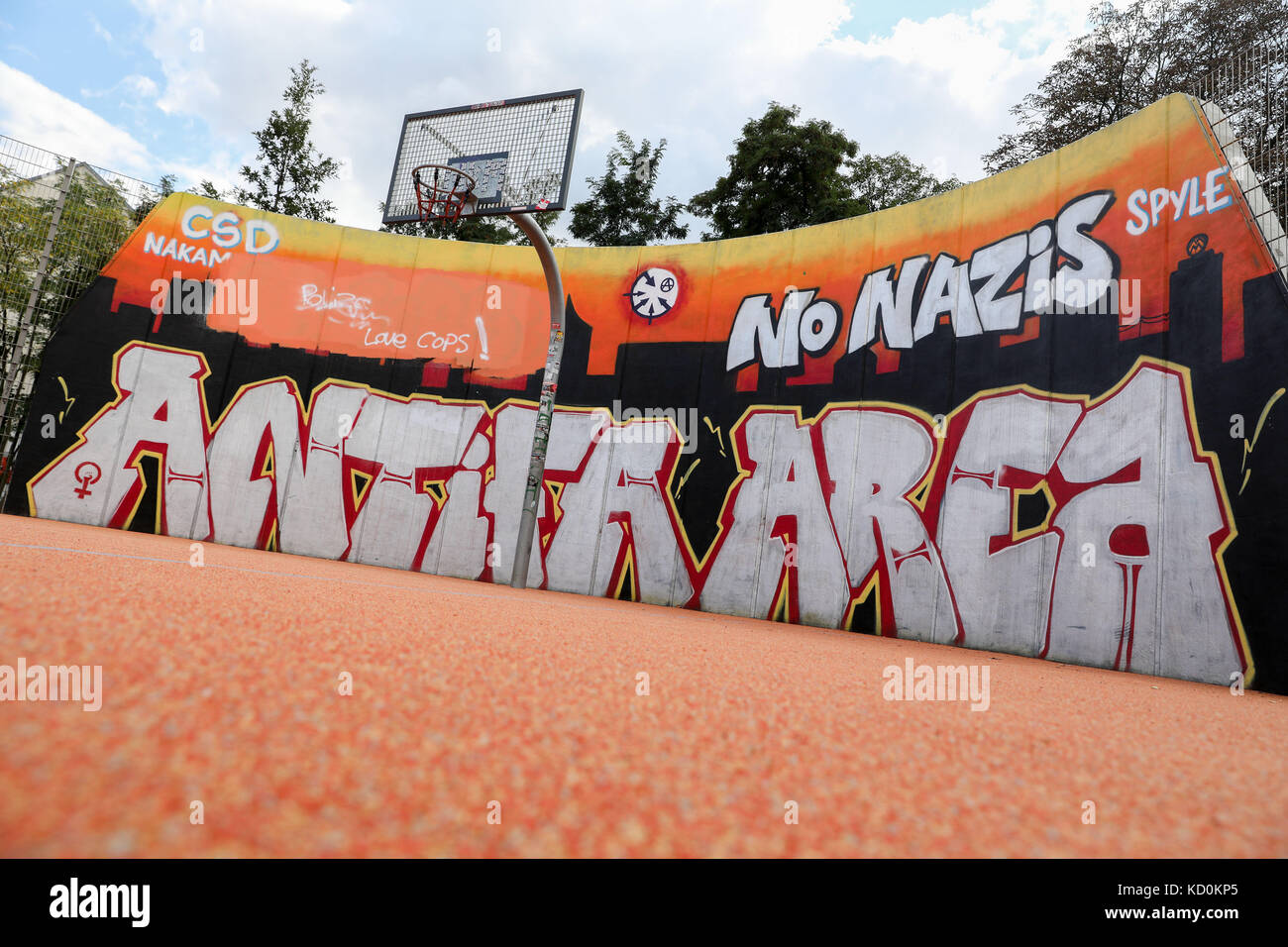 The letters "No Cops" have been painted over at a basketball field in ...