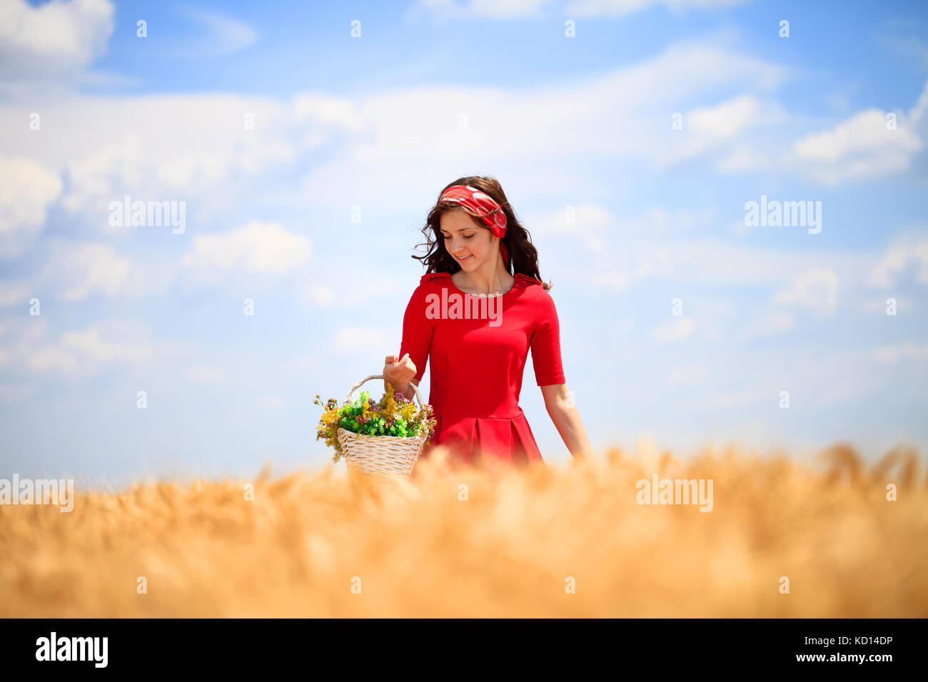 Girl walking across field hi-res stock photography and images - Alamy