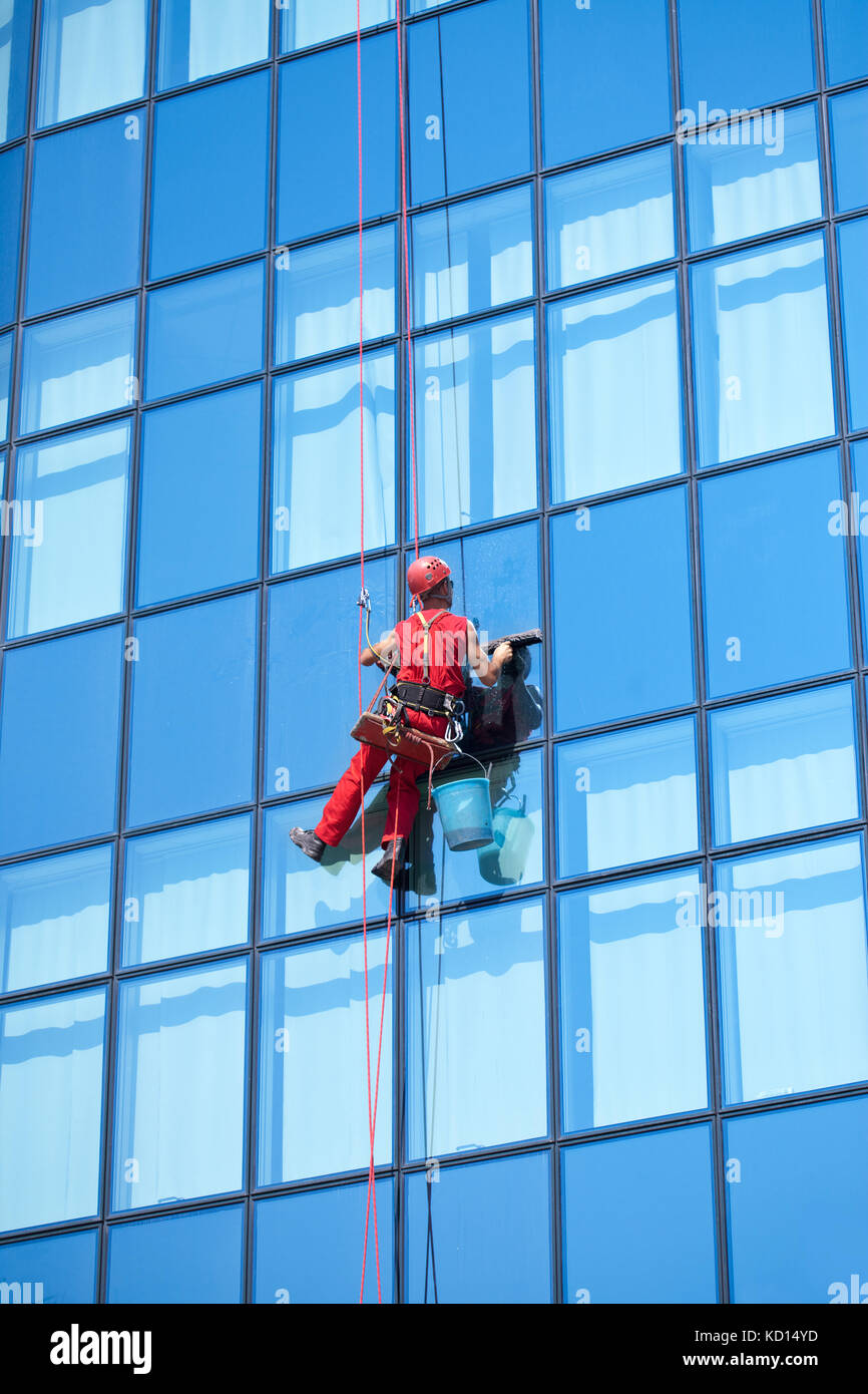 window washer on modern office building Stock Photo - Alamy