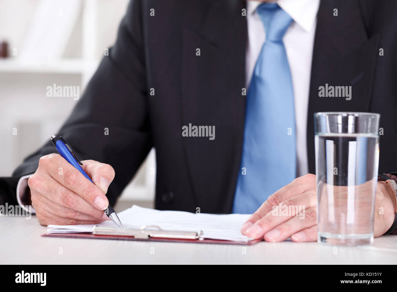 business men hand with pen writing paper document Stock Photo - Alamy